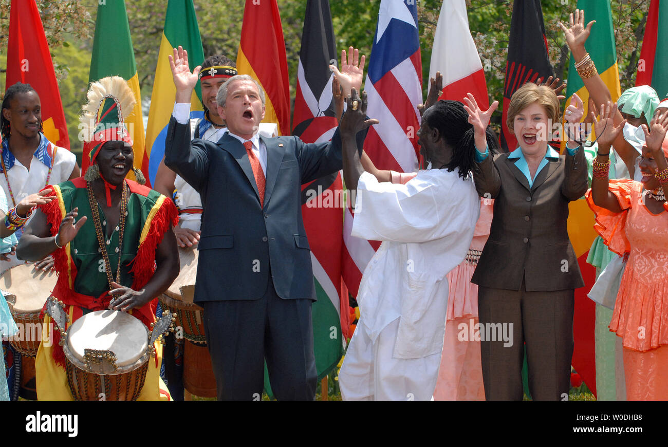 U.S. President George W. Bush and First Lady Laura Bush dance with ...