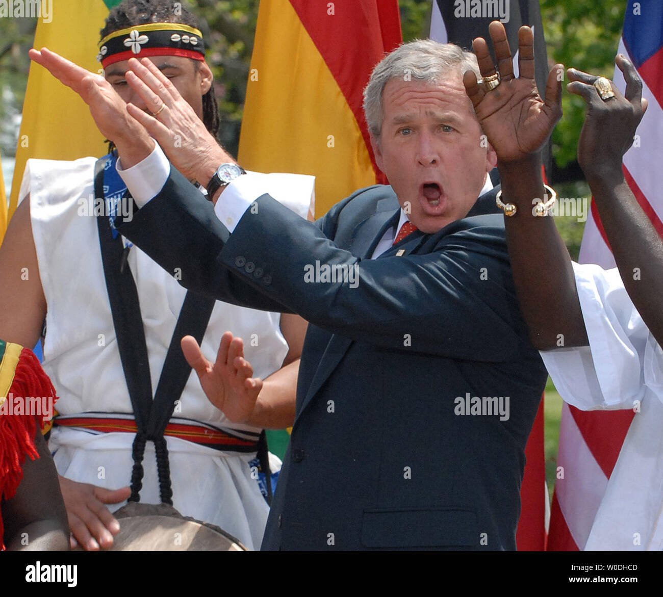 U.S. President George W. Bush dances during a performance by the ...
