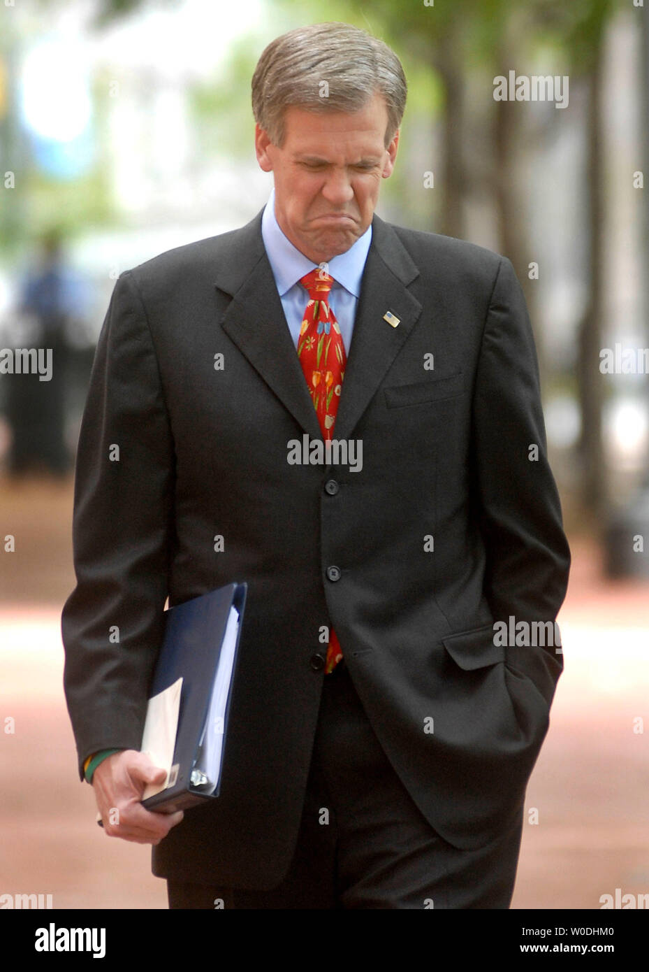 White House Press Secretary Tony Snow leaves the White House briefing ...
