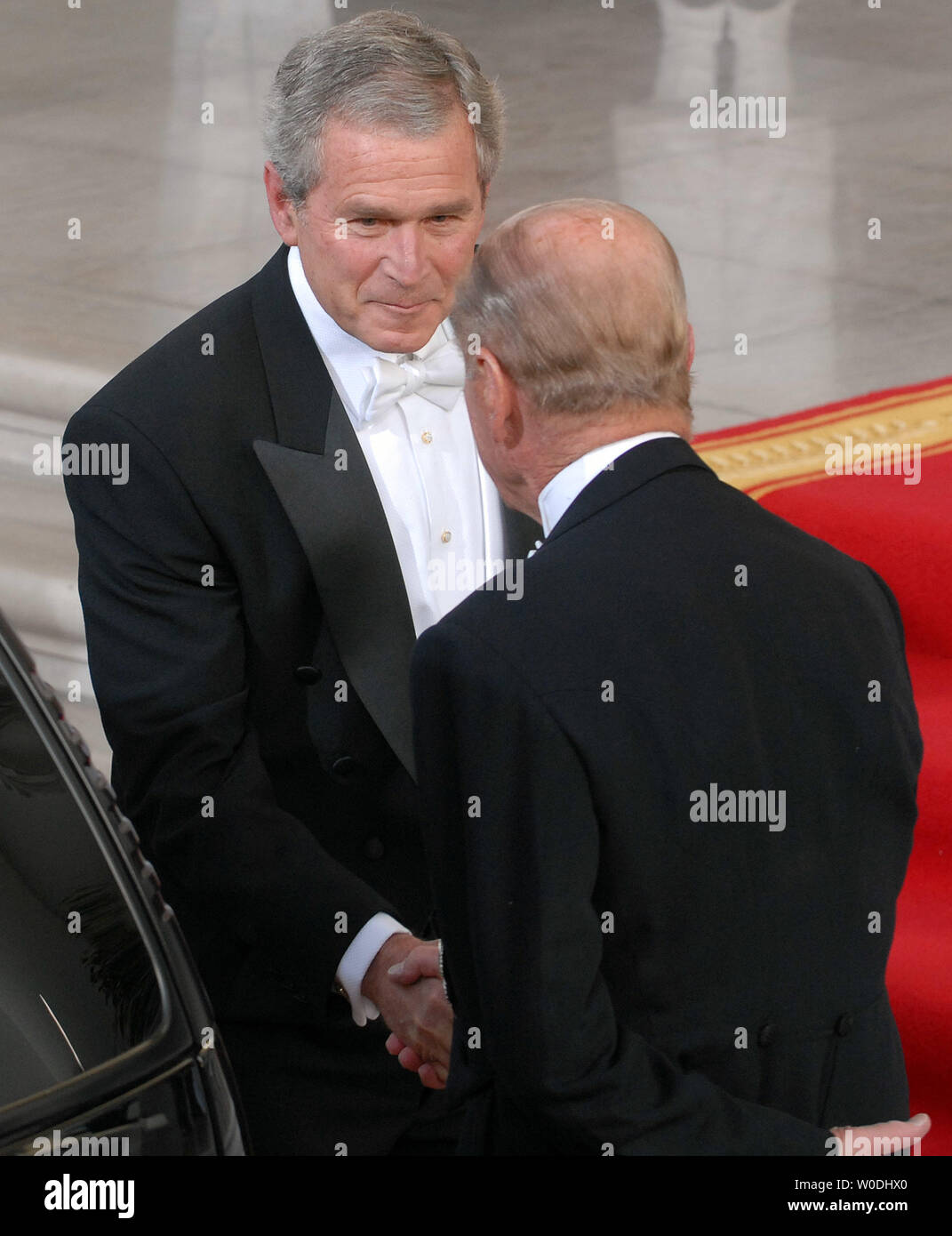U.S. President George W. Bush greets Prince Philip, Britain's Queen ...
