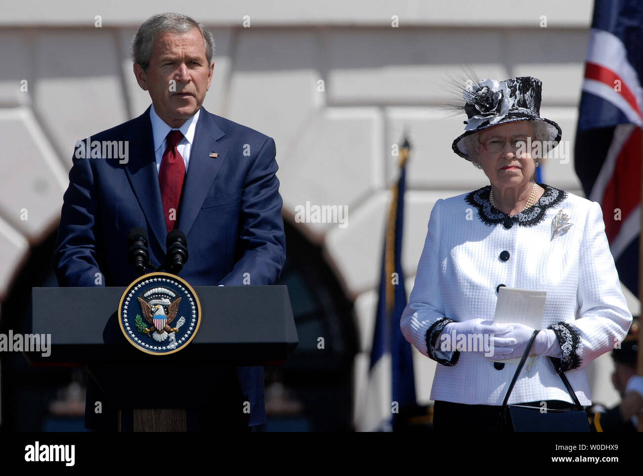 U.S. President George W. Bush delivers remarks as Britain's Queen ...