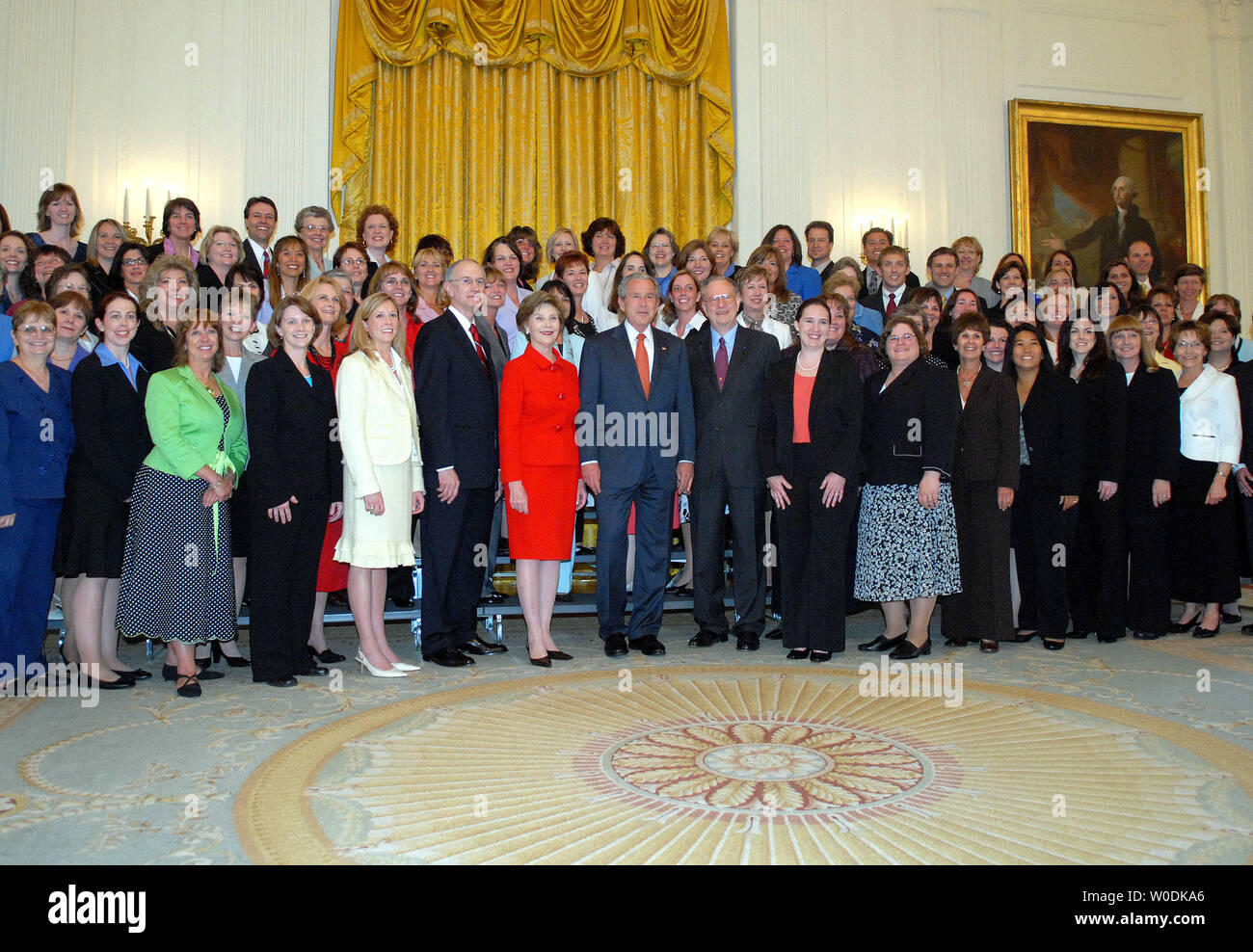 U.S. President George W. Bush and First Lady Laura Bush pose with ...