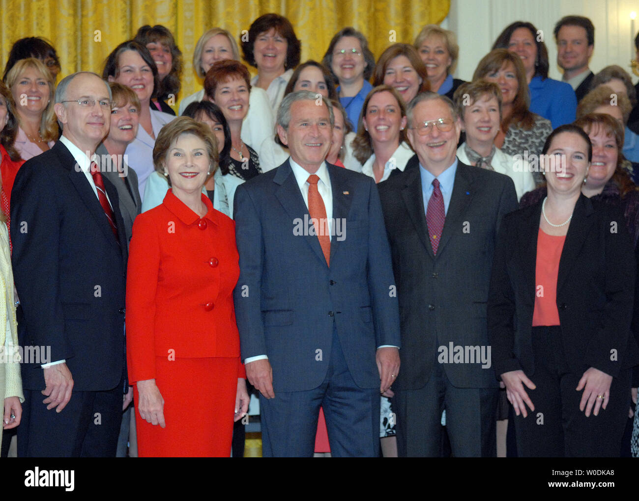 U.S. President George W. Bush and First Lady Laura Bush pose with ...