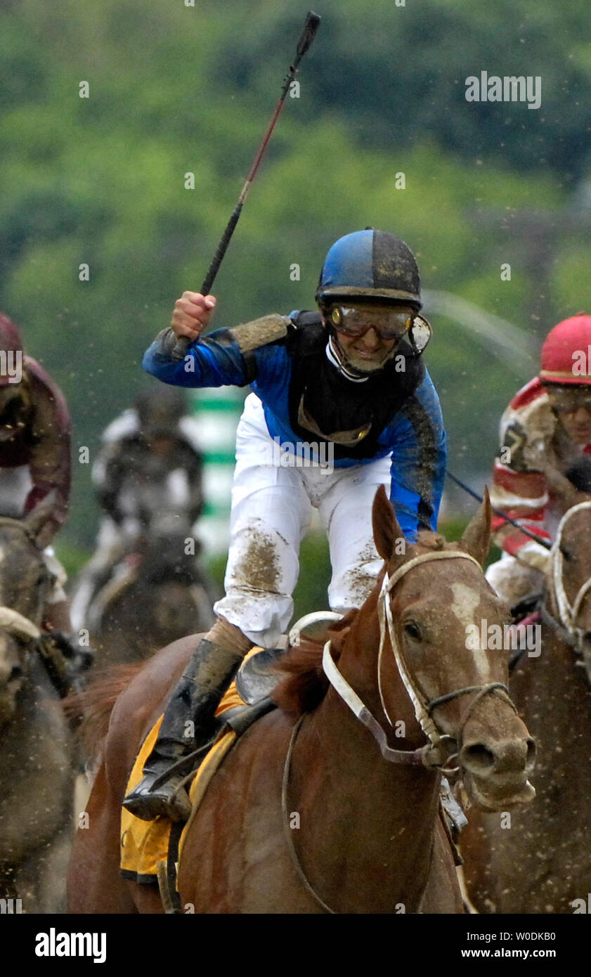 Jockey Robby Albarado riding Curlin celebrates as he crosses the finish ...
