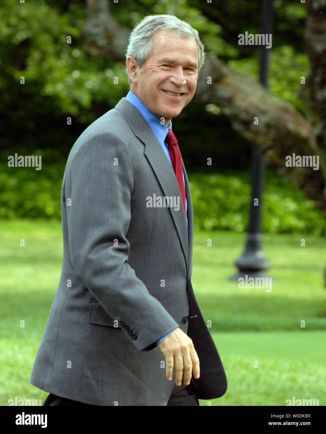 U.S. President George W. Bush arrives on the South Lawn of the White ...