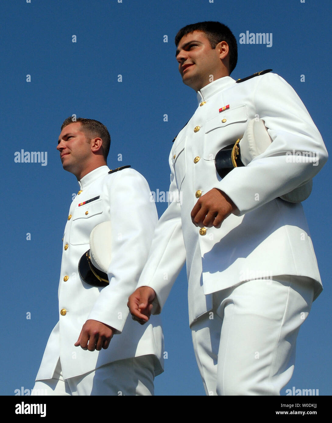 Members of the graduating class process into Navy-Marine Corps stadium ...