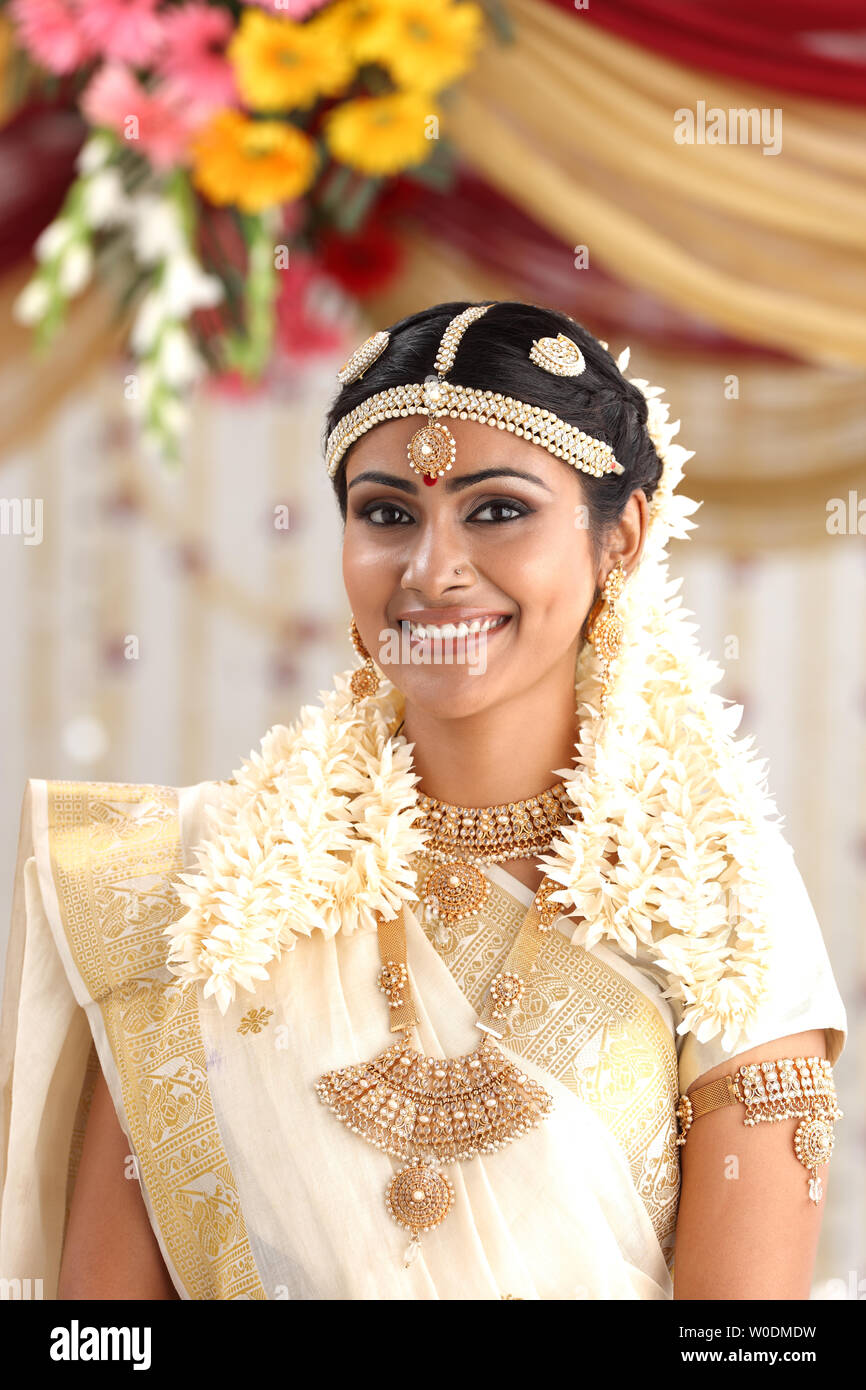 Portrait of an Indian bride smiling Stock Photo - Alamy