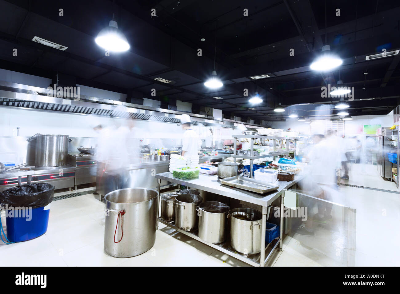 Modern and busy chefs Stock Photo - Alamy