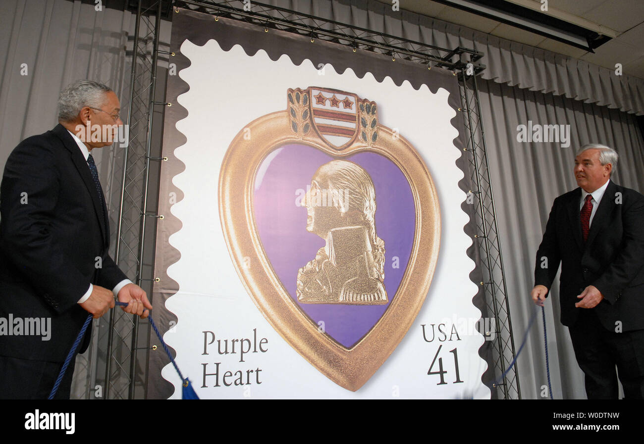 Former Secretary of State Colin Powell (L) and U.S. Postmaster General ...
