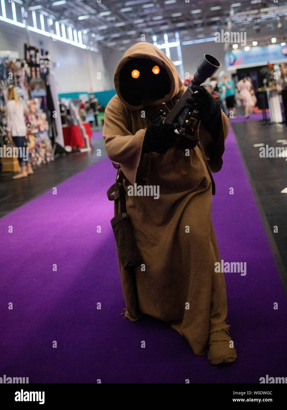 Cologne, Germany. 27th June, 2019. A cosplayer acts at the comic and ...