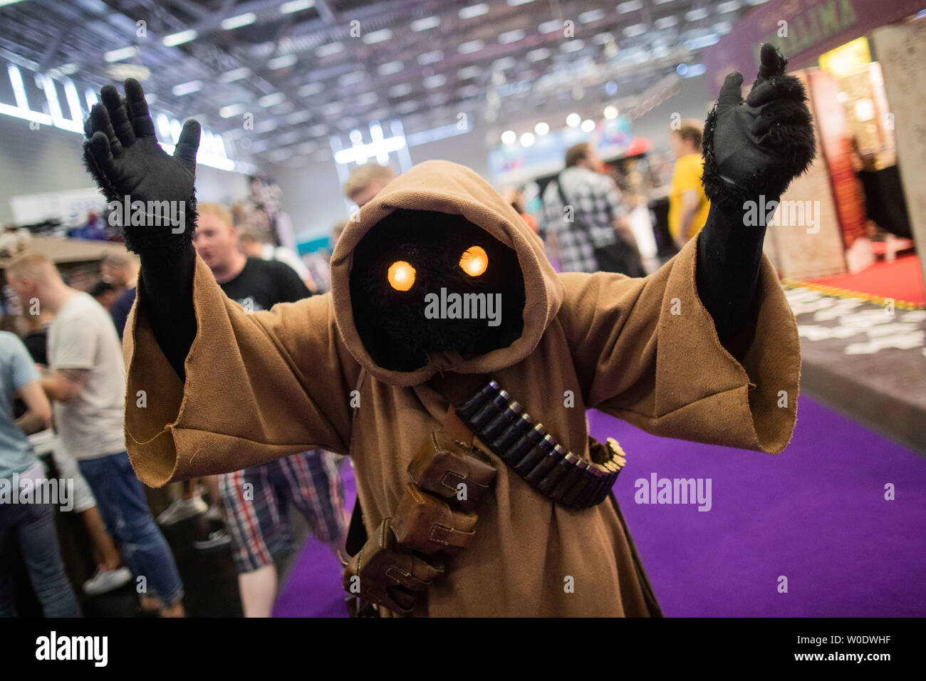 Cologne, Germany. 27th June, 2019. A cosplayer acts at the comic and ...