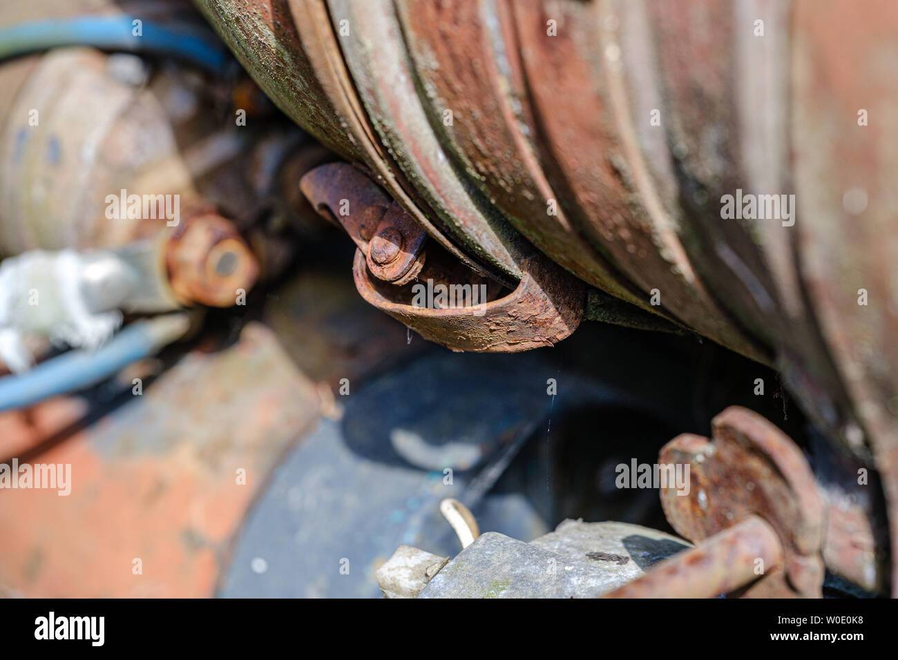 vintage retro tractor rusty details close up. gearbox, levers, viring ...