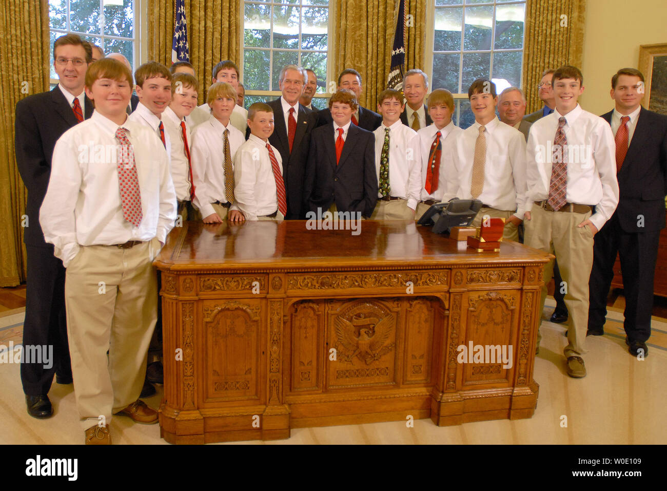 U.S. President George W. Bush (C) poses for photographs with the 2007 ...