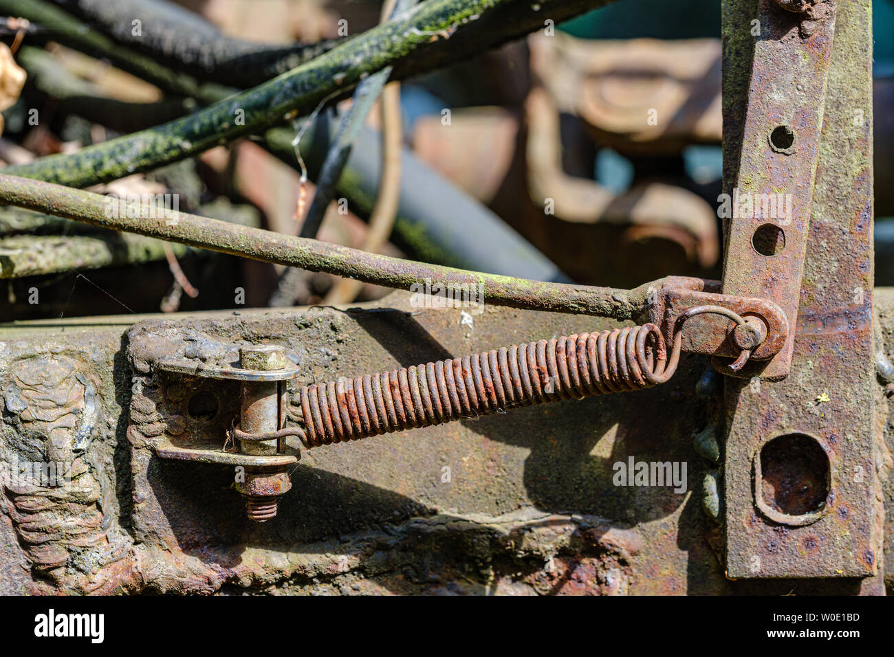 vintage retro tractor rusty details close up. gearbox, levers, viring ...