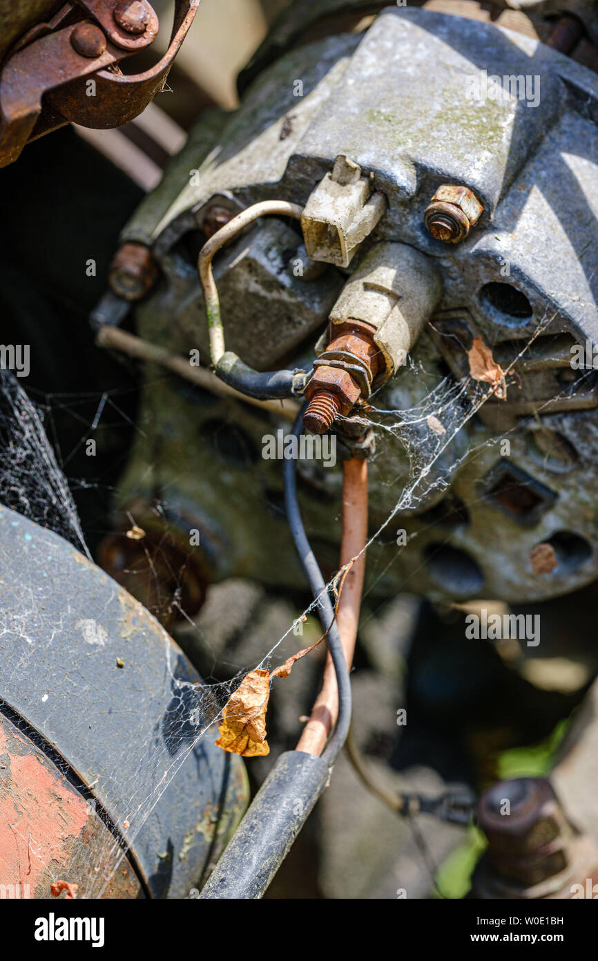 vintage retro tractor rusty details close up. gearbox, levers, viring ...