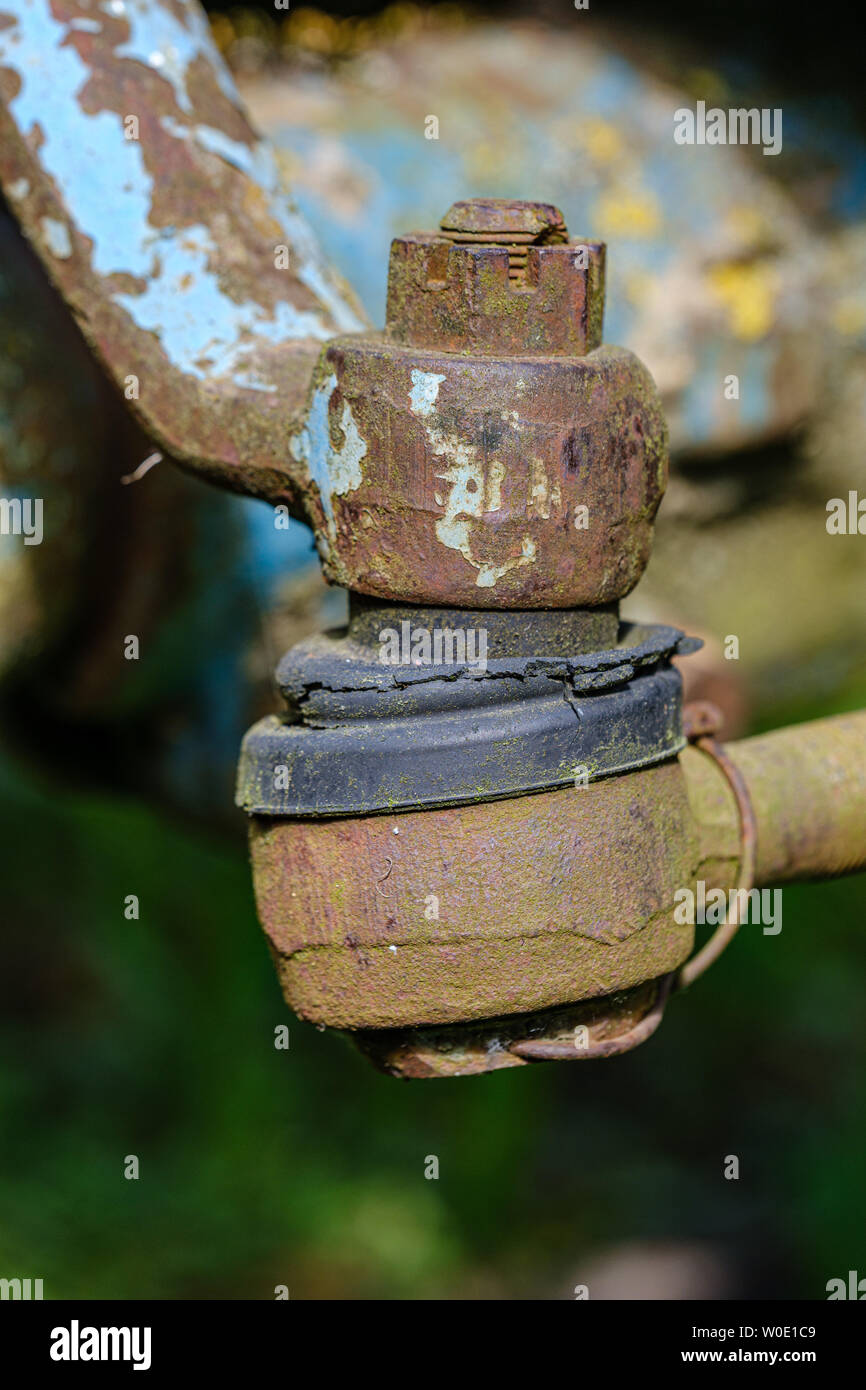 vintage retro tractor rusty details close up. gearbox, levers, viring ...