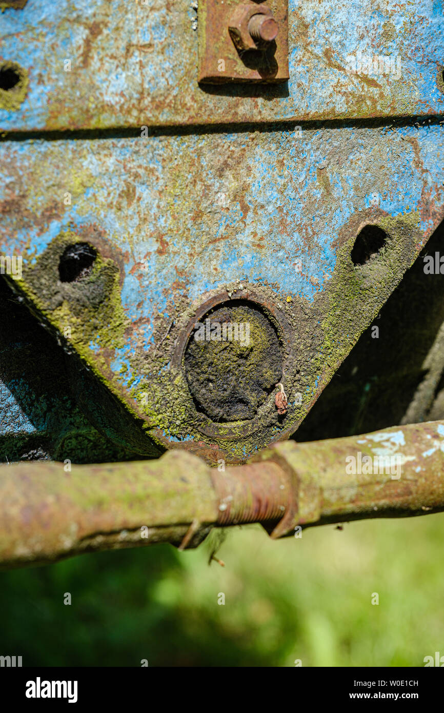 vintage retro tractor rusty details close up. gearbox, levers, viring ...