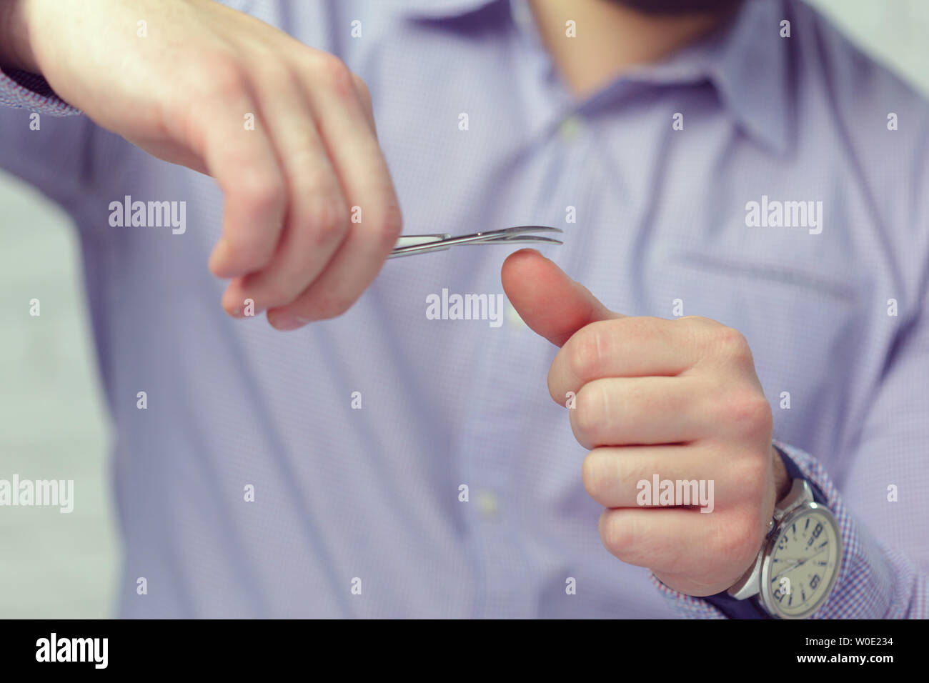 young man polishing his nails Stock Photo - Alamy