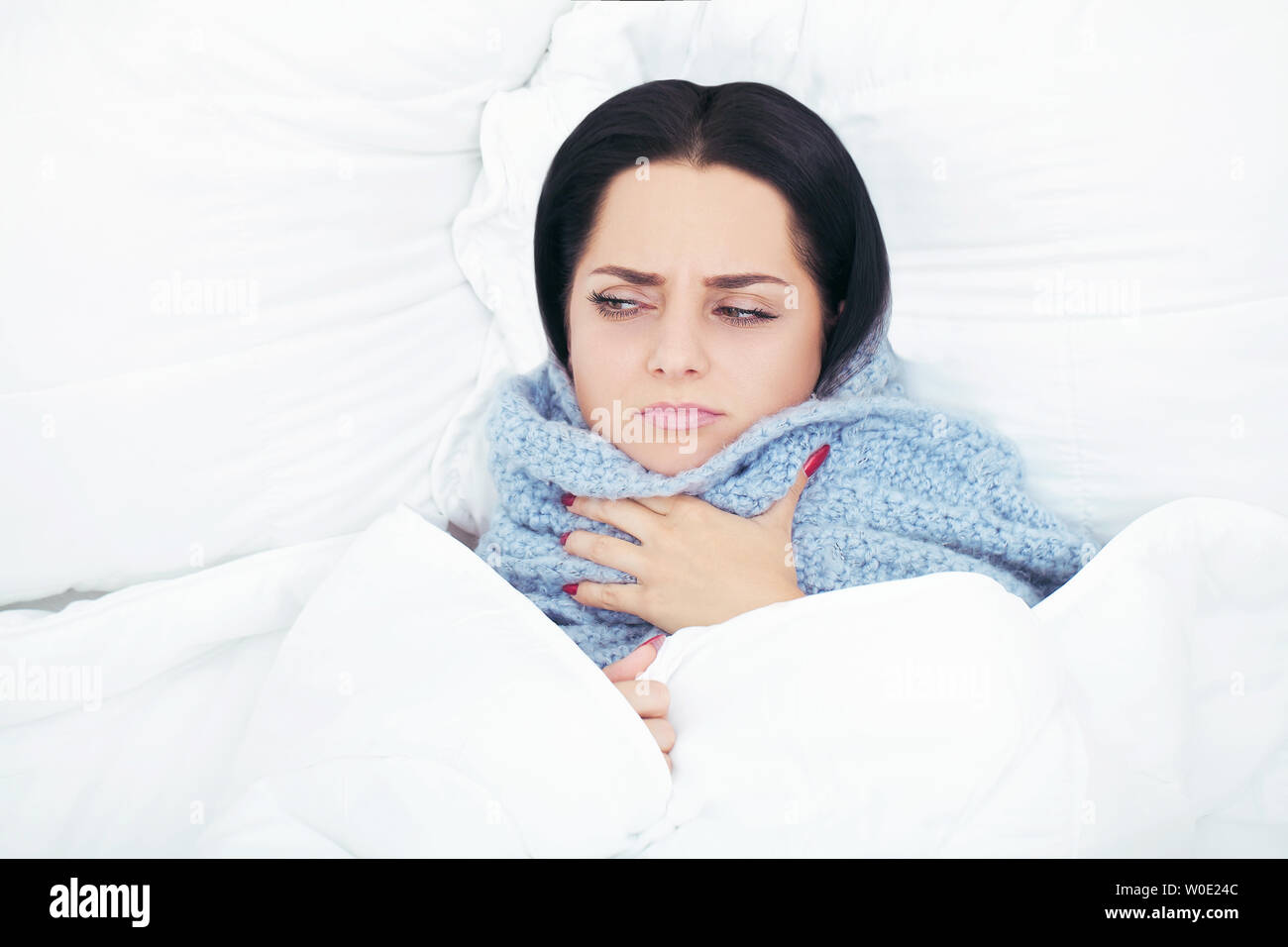 Beautiful woman lying and sleep on the snowy bed Stock Photo - Alamy
