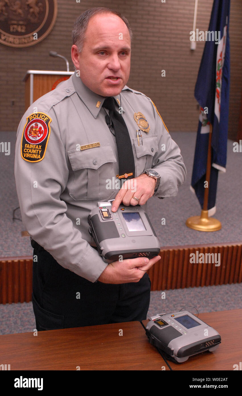 Lt. Vince Byrd, of the Fairfax County Police Department, demonstrates a ...