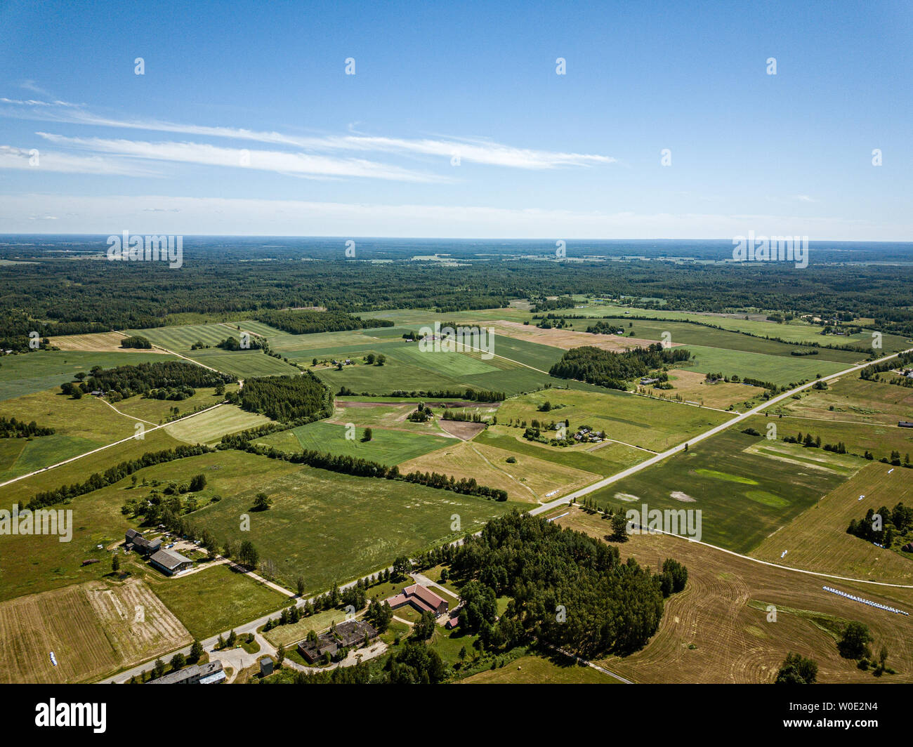 countryside roads and fields with small village. aerial view, drone ...