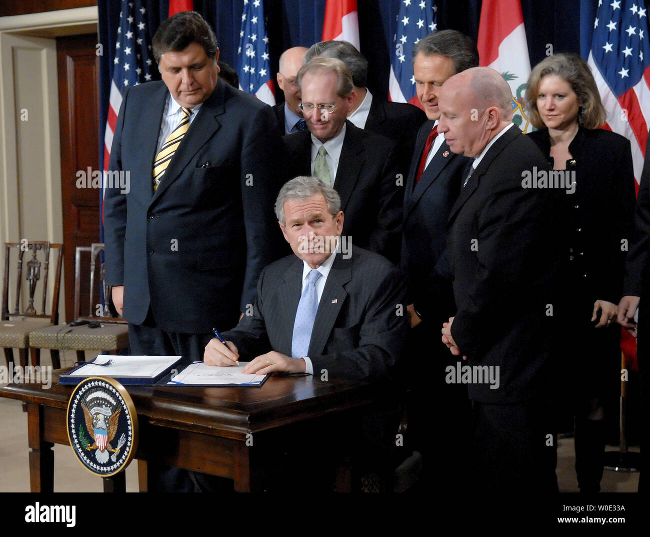 U.S. President George W. Bush signs H.R. 3688, the United States-Peru ...