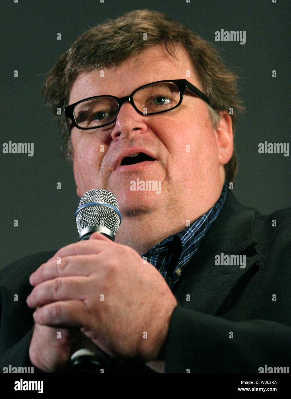 Film maker Michael Moore answers questions before a screening of his ...