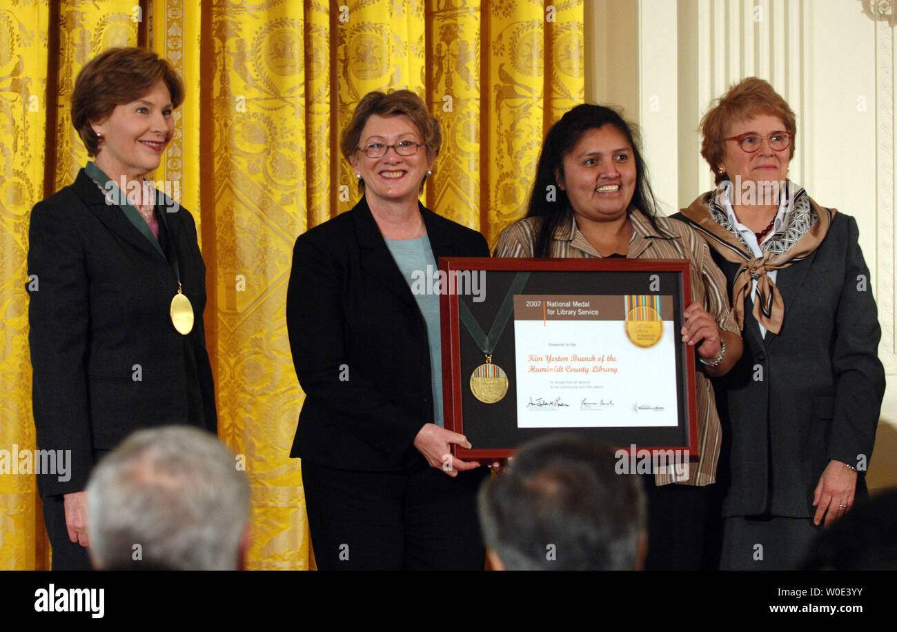 First Lady Laura Bush (L) and Dr. Anne-Imelda Radice, Institute of ...