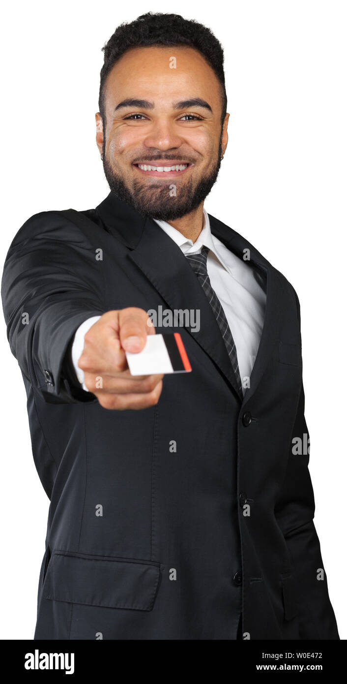 Happy smiling young man holding a credit card isolated on white ...