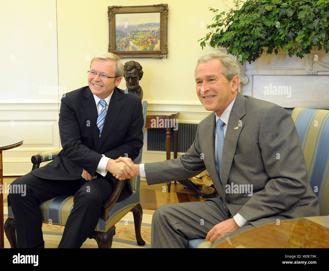U.S. President George W. Bush shakes hands with Australian Prime ...