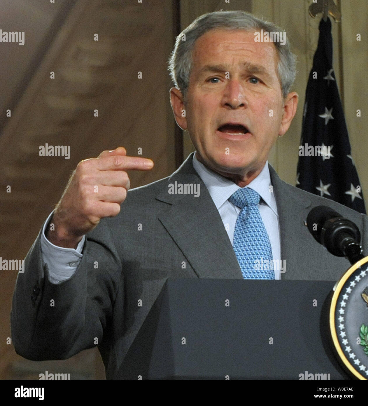 U.S. President George W. Bush speaks to the media in the East Room of ...