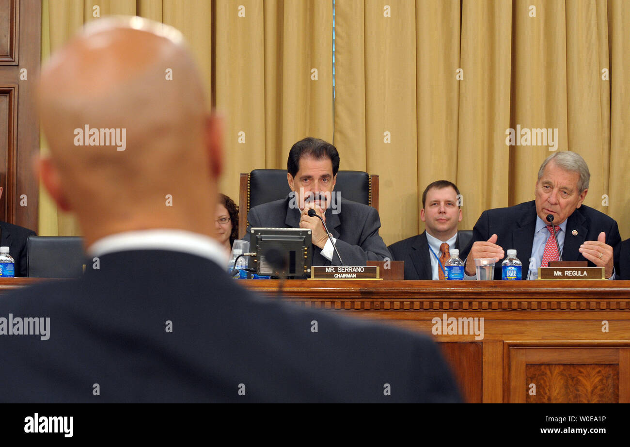 Rep. Ralph Regula, R-OH, speaks as D.C. Mayor Adrian Fenty appears ...
