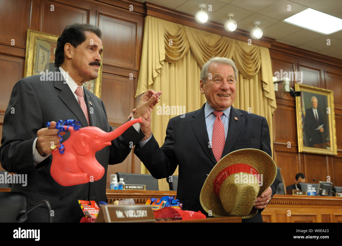 Rep. Jose Serrano, D-NY, gives retiring Rep. Ralph Regula, R-OH, a ...