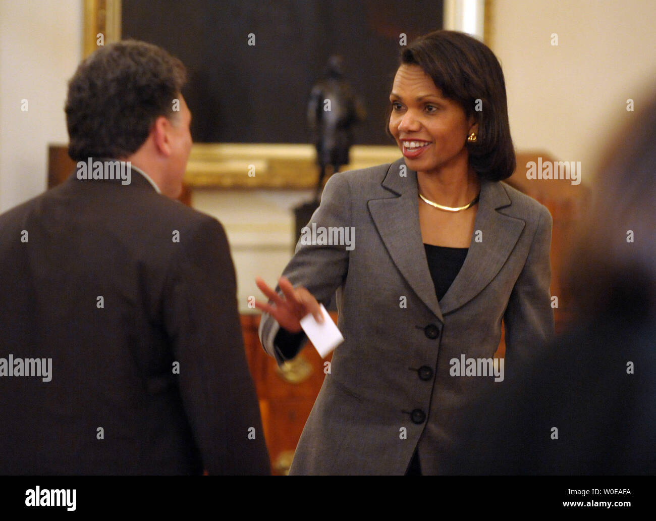 Secretary of State Condoleezza Rice chats with guests as she departs ...