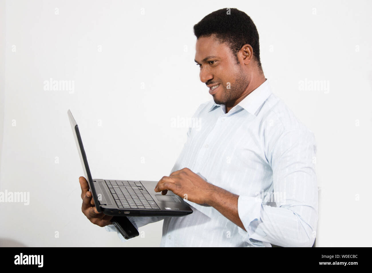 A man with computer Stock Photo - Alamy