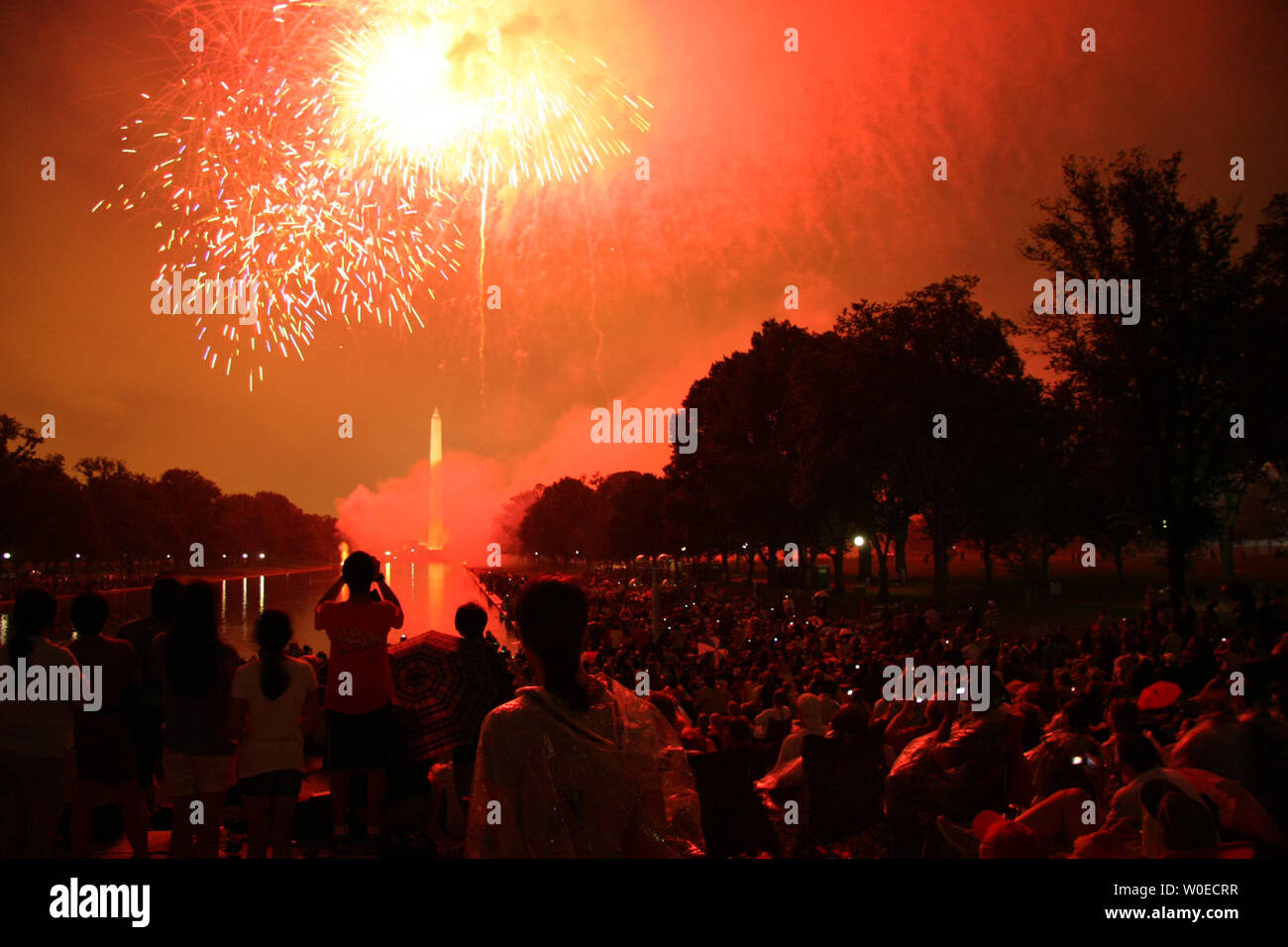 Fireworks explode in the sky above the Washington Monument as the ...