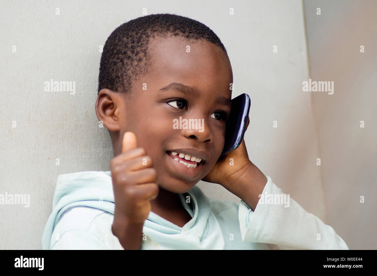 This Child Agree With What His Mother Told Him Meaning By This Gesture And Smile Stock Photo Alamy this-child-agree-with-what-his-mother-told-him-meaning-by-this-gesture-and-smile-stock-photo-alamy