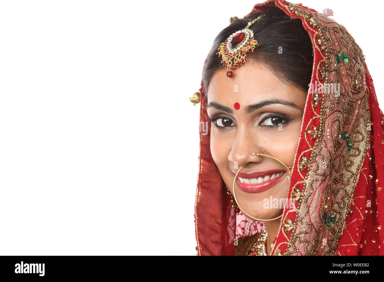 Portrait of an Indian young bride smiling Stock Photo - Alamy