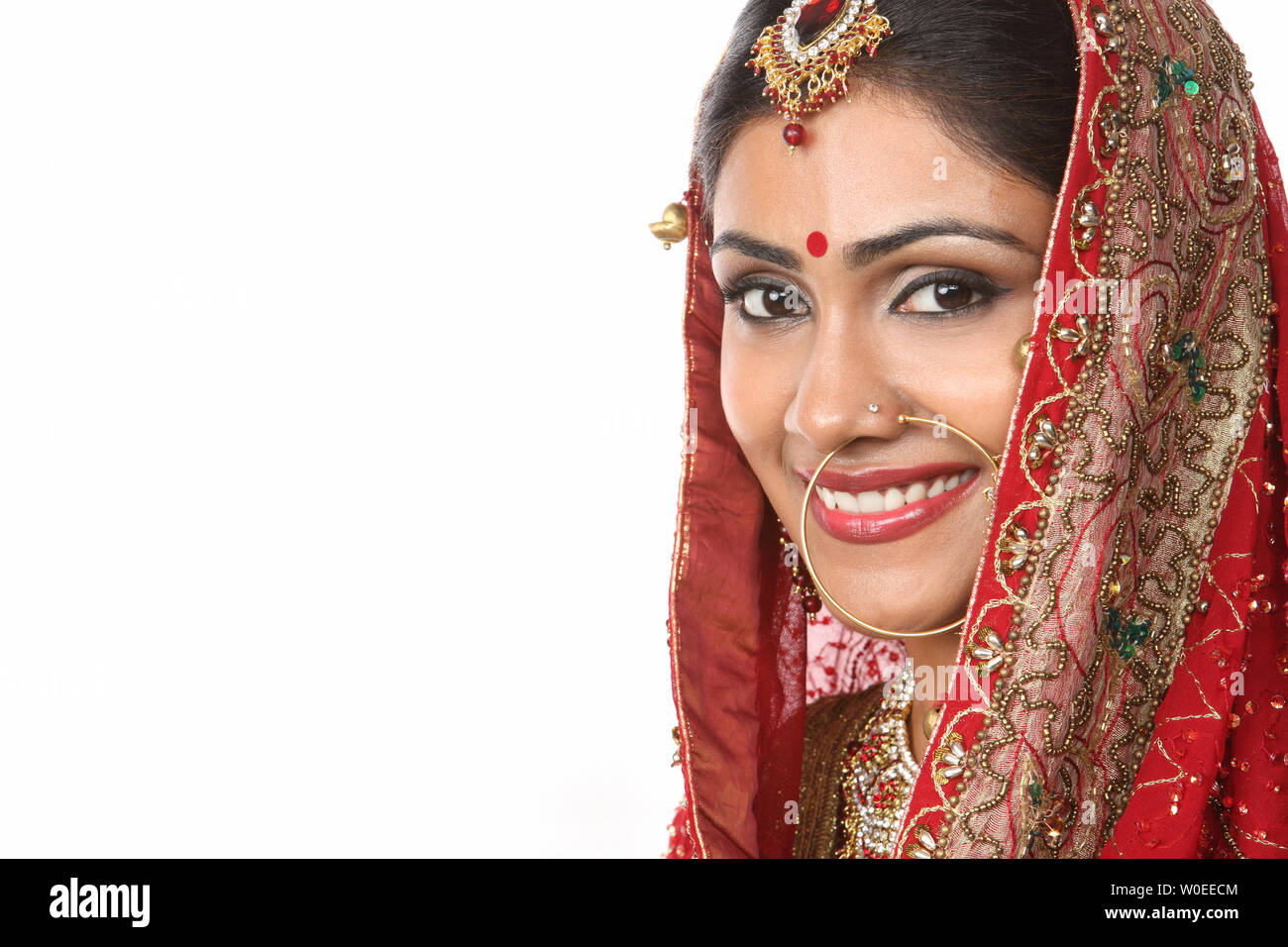 Portrait of an Indian young bride smiling Stock Photo - Alamy