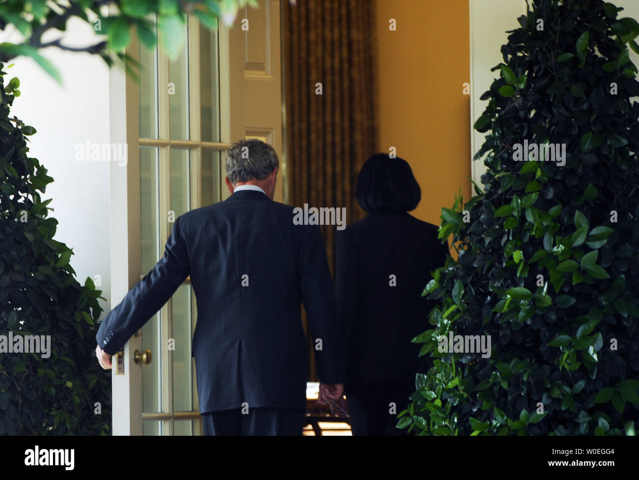 U.S. President George W. Bush (L) and Secretary of State Condoleezza ...