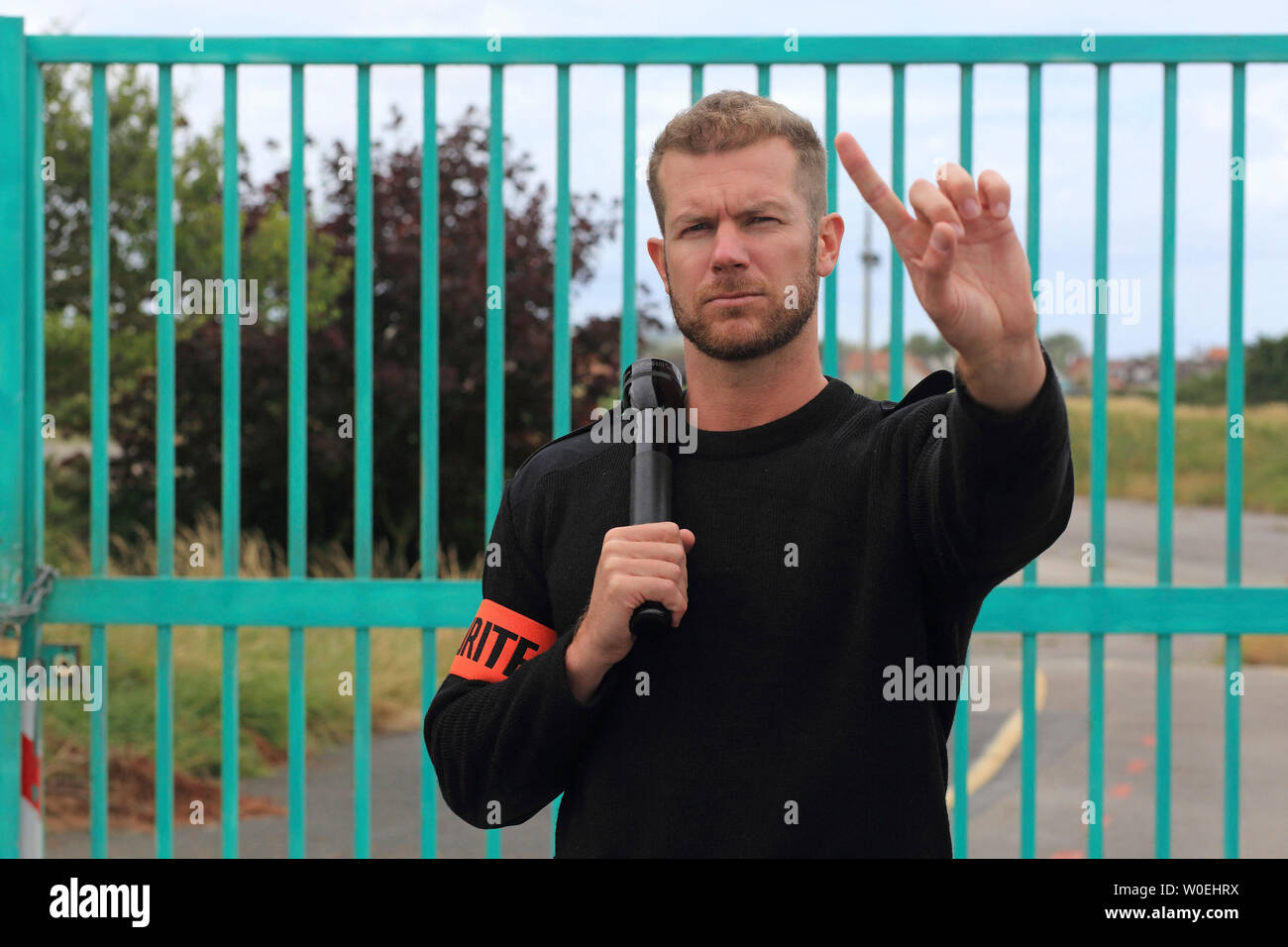 Security guard in front hi-res stock photography and images - Alamy