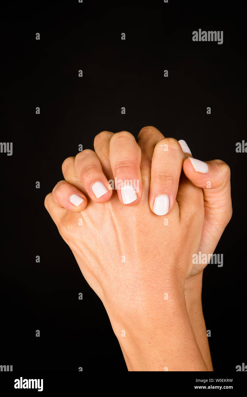Female hands in a praying gesture, a concept Stock Photo - Alamy