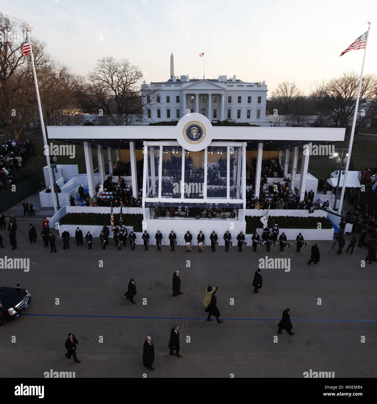 U.S. President Barack Obama walks with First Lady Michelle Obama along ...