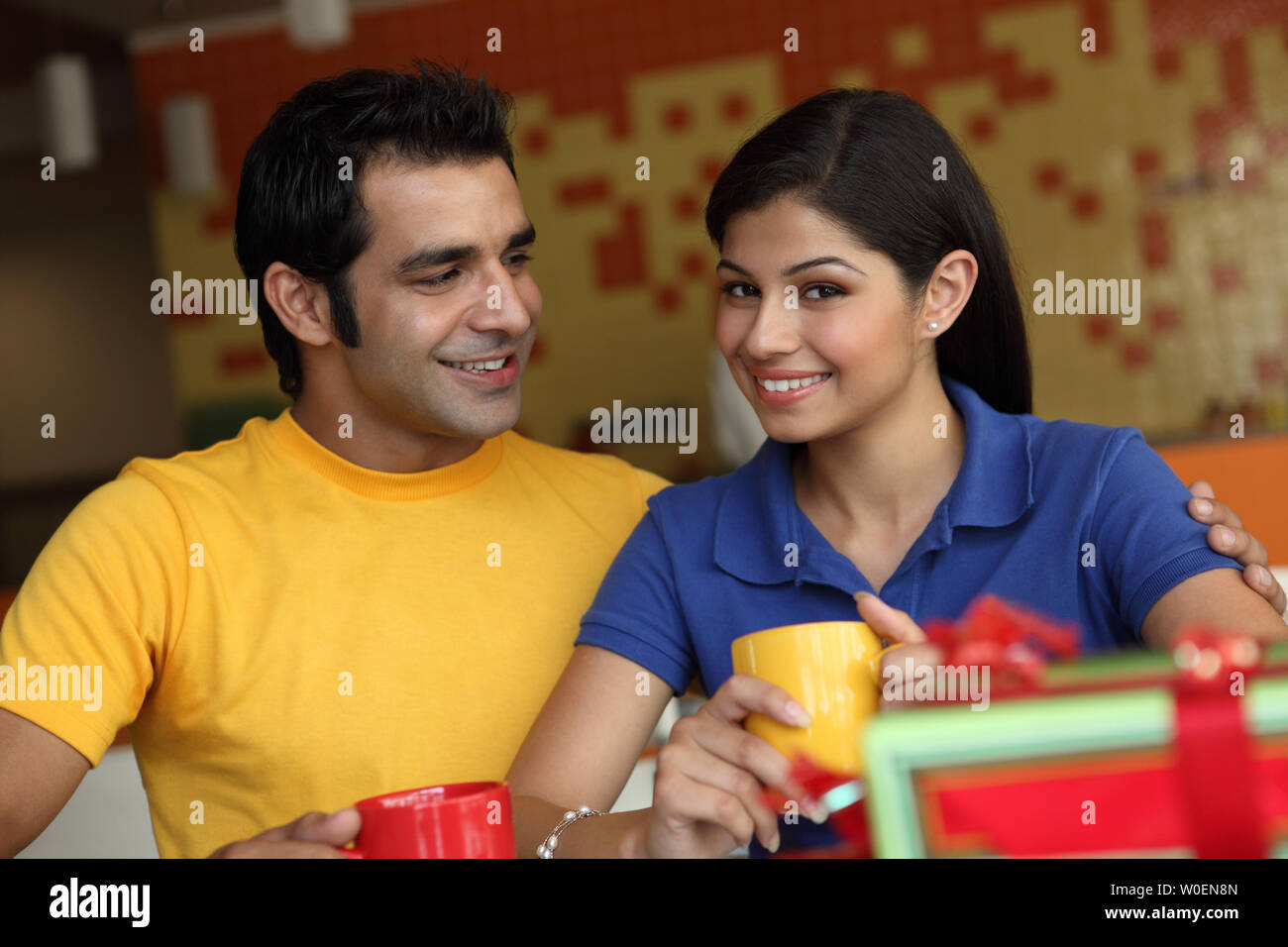 Indian couple having coffee hi-res stock photography and images - Alamy