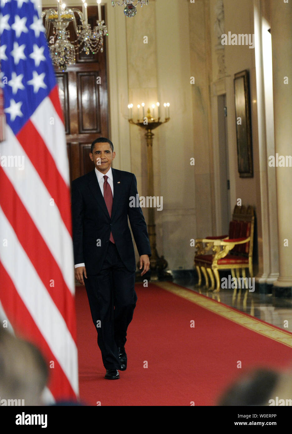 U.S. President Barack Obama arrives to speak to the media during a news ...