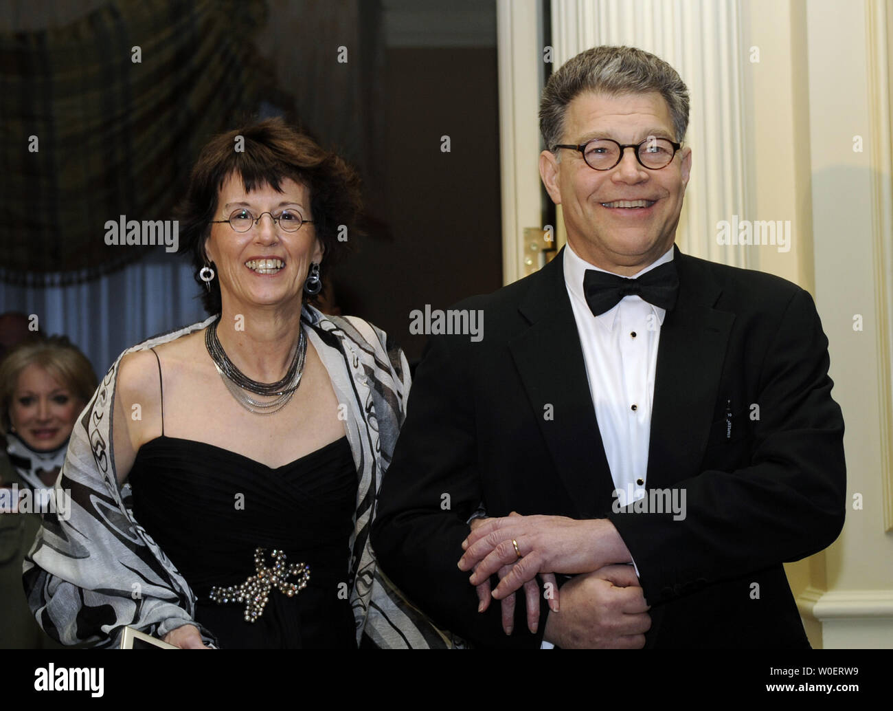Al Franken (R) and his wife Franni arrive at the USO Annual Awards ...