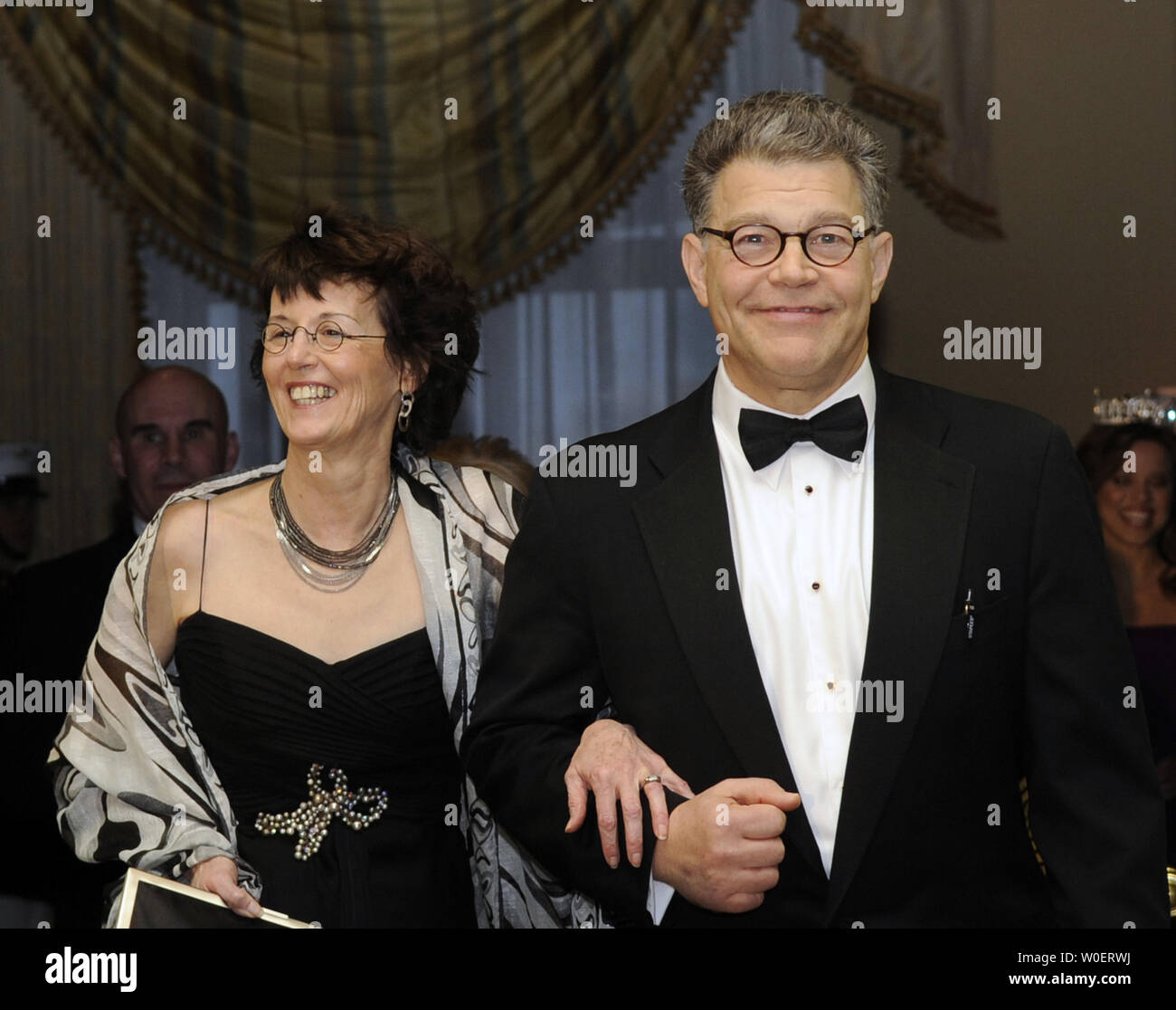 Al Franken (R) and his wife Franni arrive at the USO Annual Awards ...