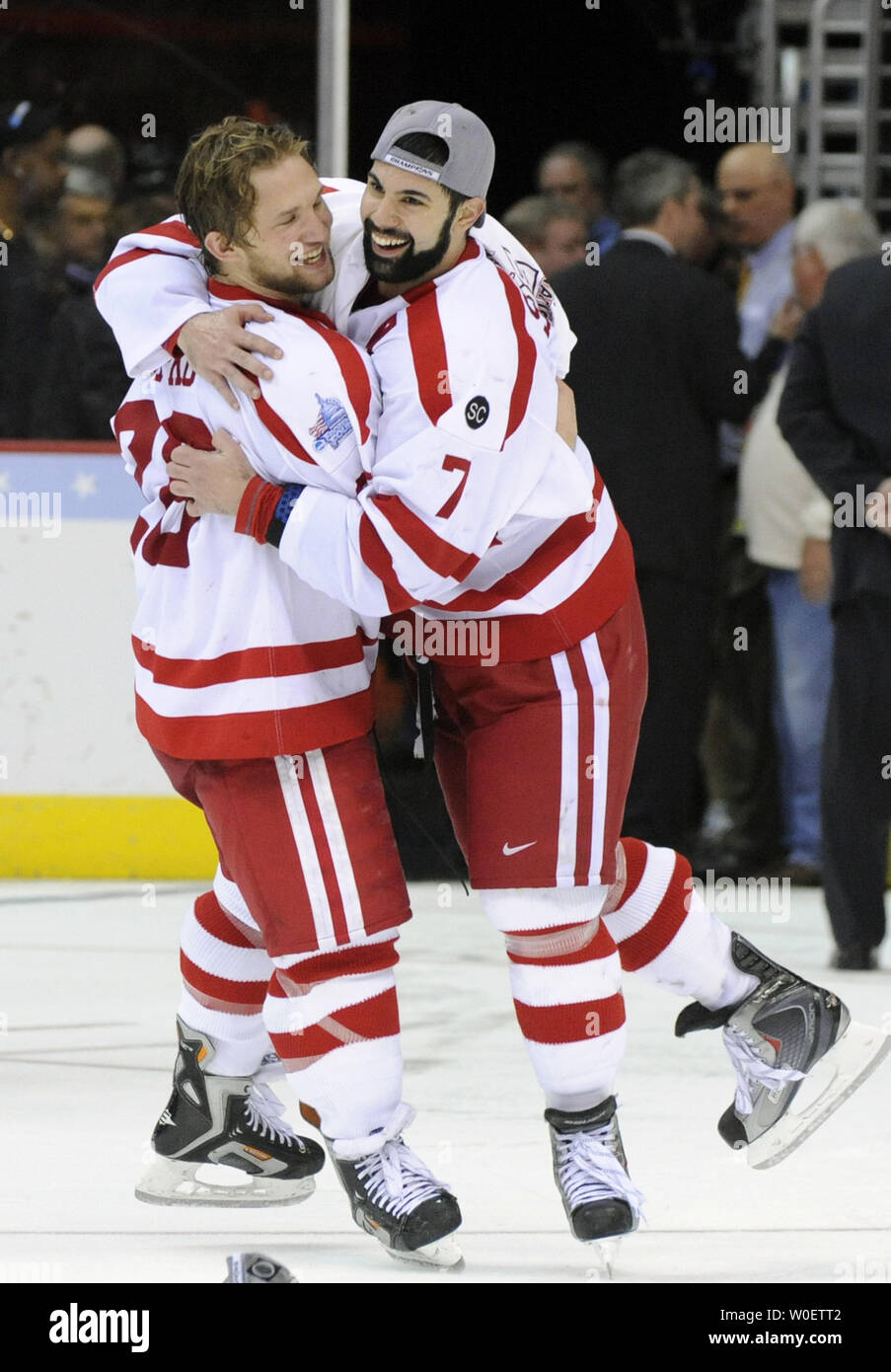 Boston University's Luke Popko (L) and Brian Strait celebrate their ...