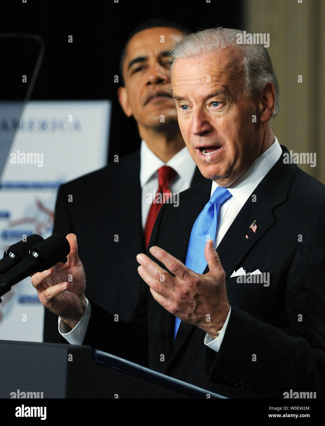 U.S. President Barack Obama listens as Vice President Joe Biden ...