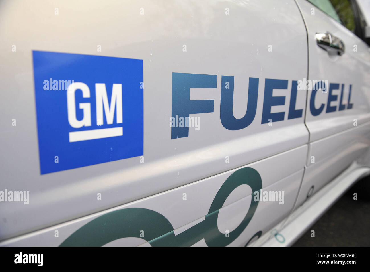 The GM Fuel Cell logo is seen on a Fuel Cell SUV during a demonstration ...